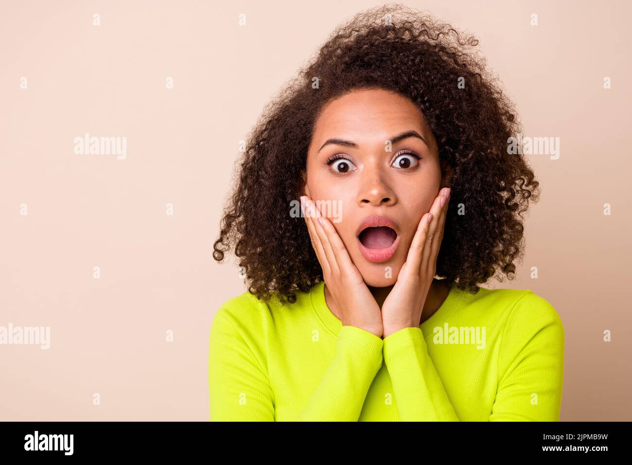 Closeup photo of young cute funny lady hold cheeks hands shocked low ...