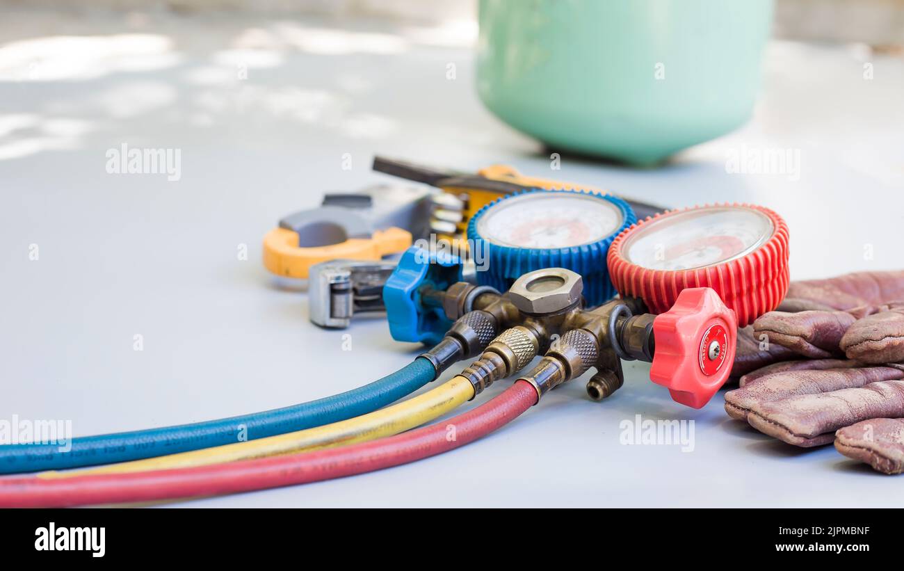 Tools for air conditioning repair and maintenance Stock Photo - Alamy