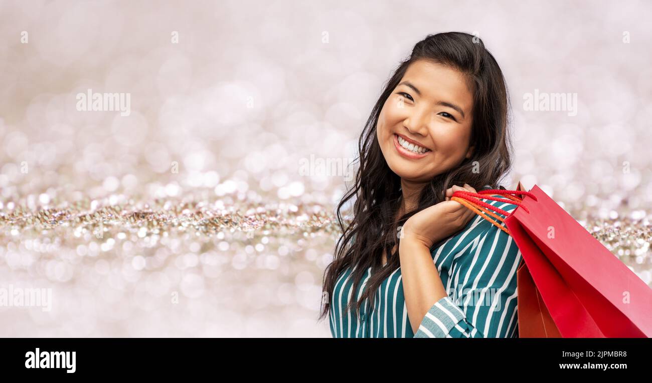 Happy asian woman shopping hi-res stock photography and images - Alamy