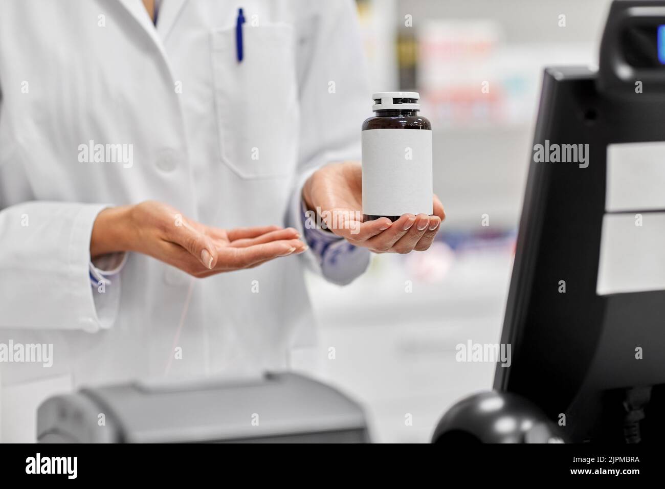 Pharmacist hand hi-res stock photography and images - Alamy