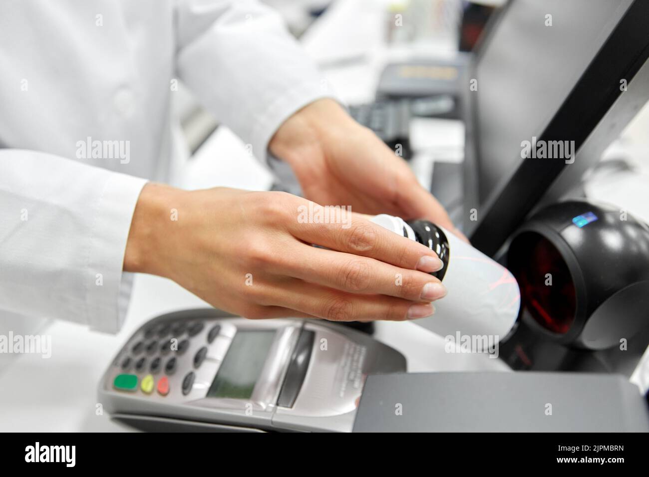 Pharmacist scanning medication scanner hi-res stock photography and ...