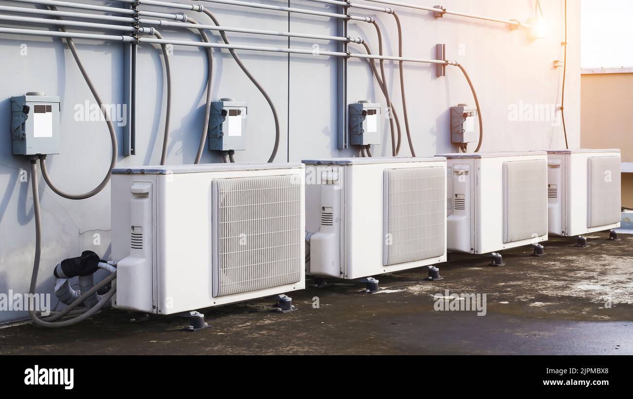 Air conditioning (HVAC) on the roof of an industrial building Stock ...