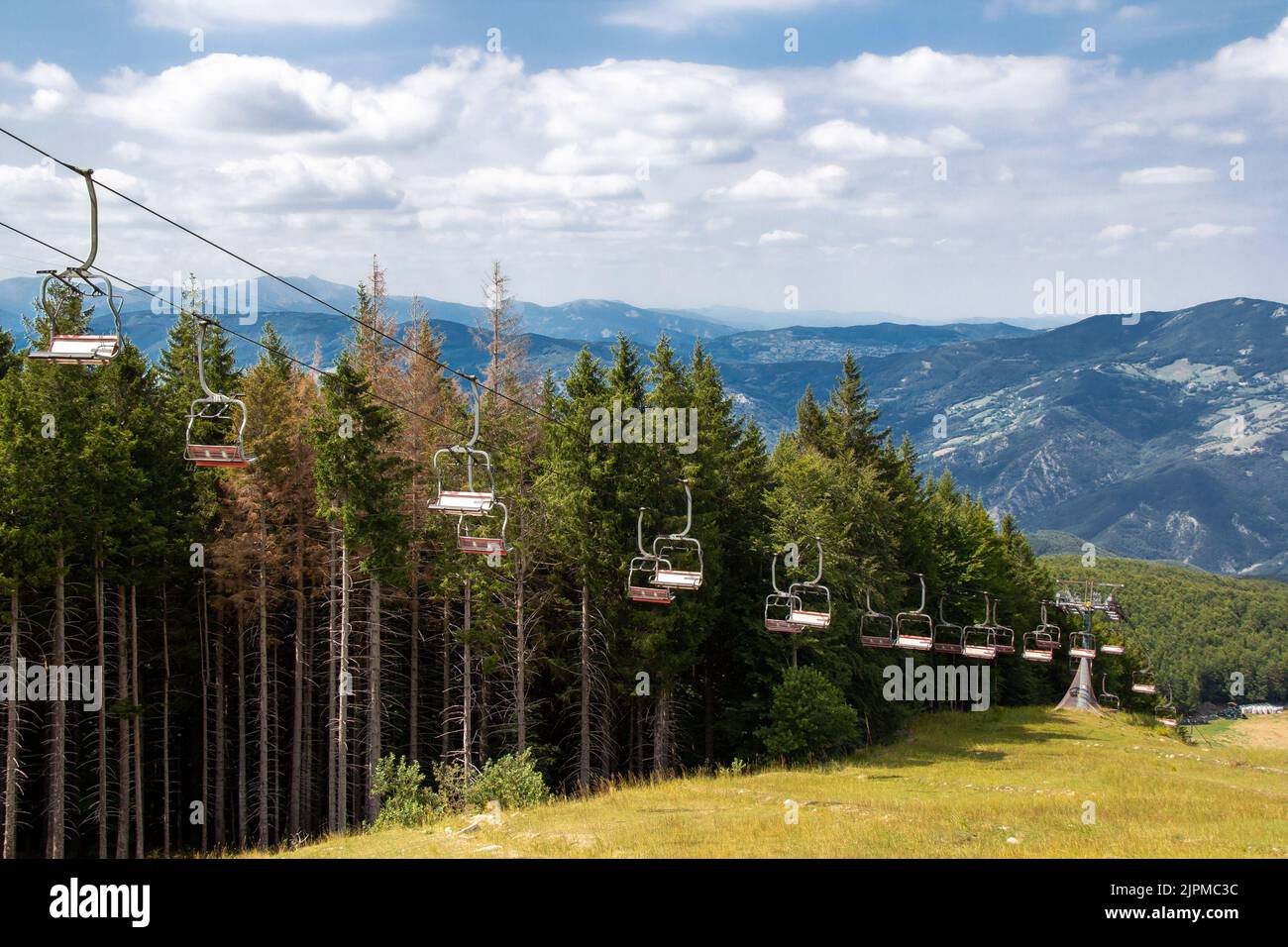 Monte Cimone cableway. Summer overhead cable car on the slopes of Monte ...