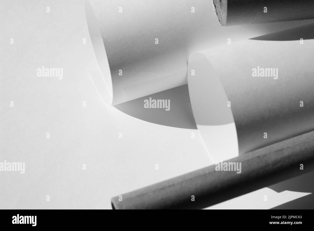 Minimal Workplace with Paper Rolls, White Paper Sheets for Blueprints ...