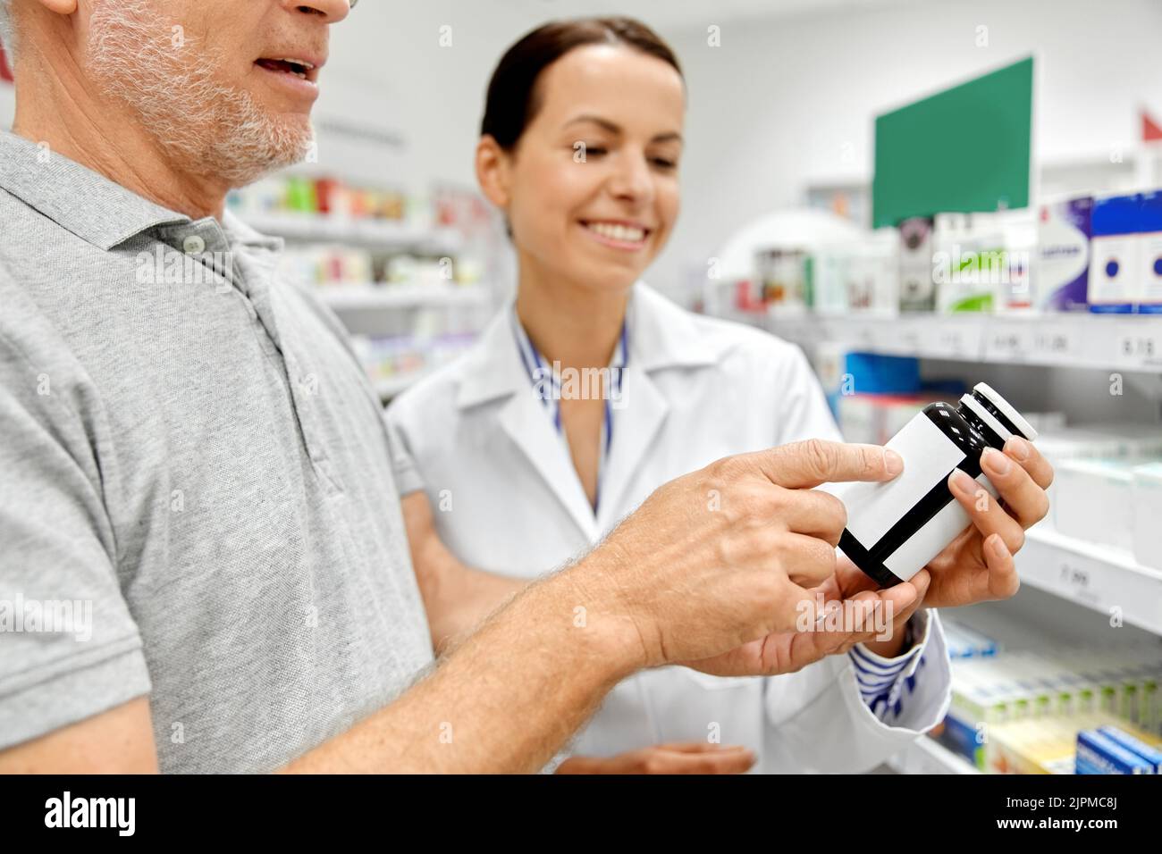 Happy pharmacist pharmacy assistant hi-res stock photography and images ...