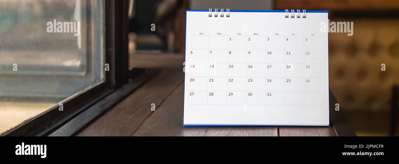 White calendar on the table in the cafe Stock Photo - Alamy