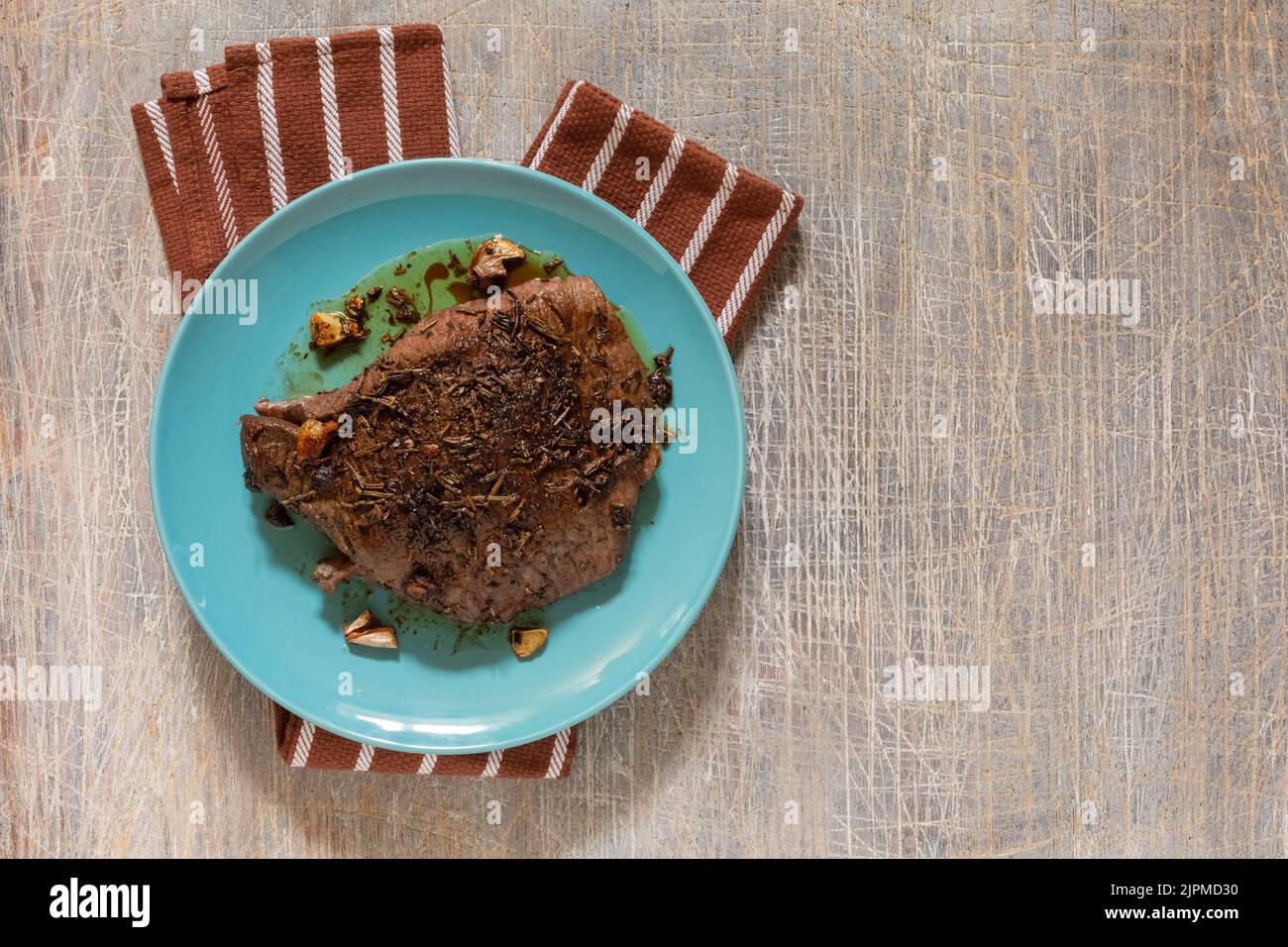 juicy steak with blood fried in a pan, top view, traditional food Stock ...