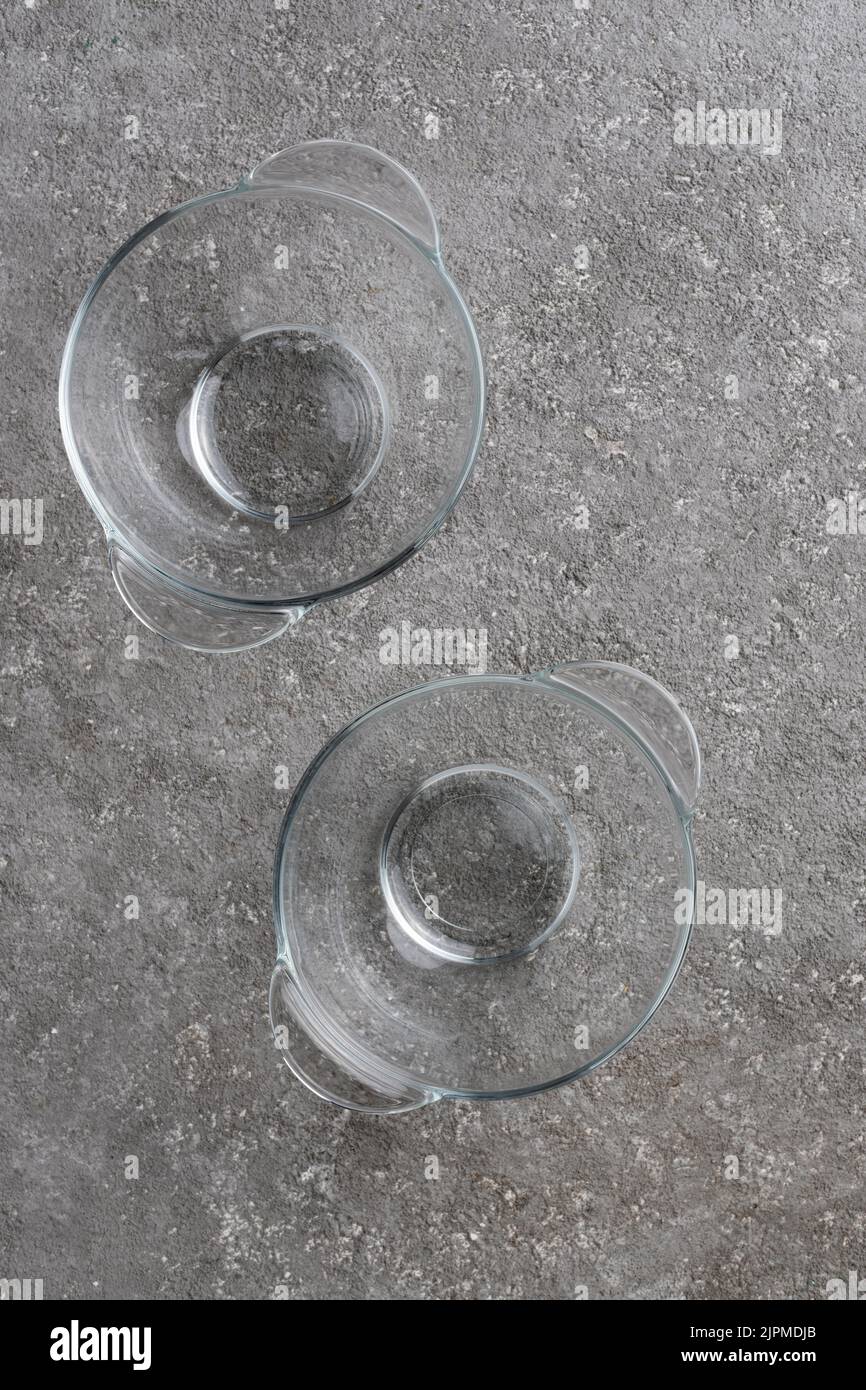 Two empty soup bowls on gray background, flat lay Stock Photo - Alamy