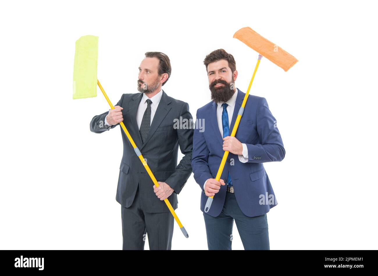 businessmen clear wall to white. Partnership and teamwork. cleaning ...