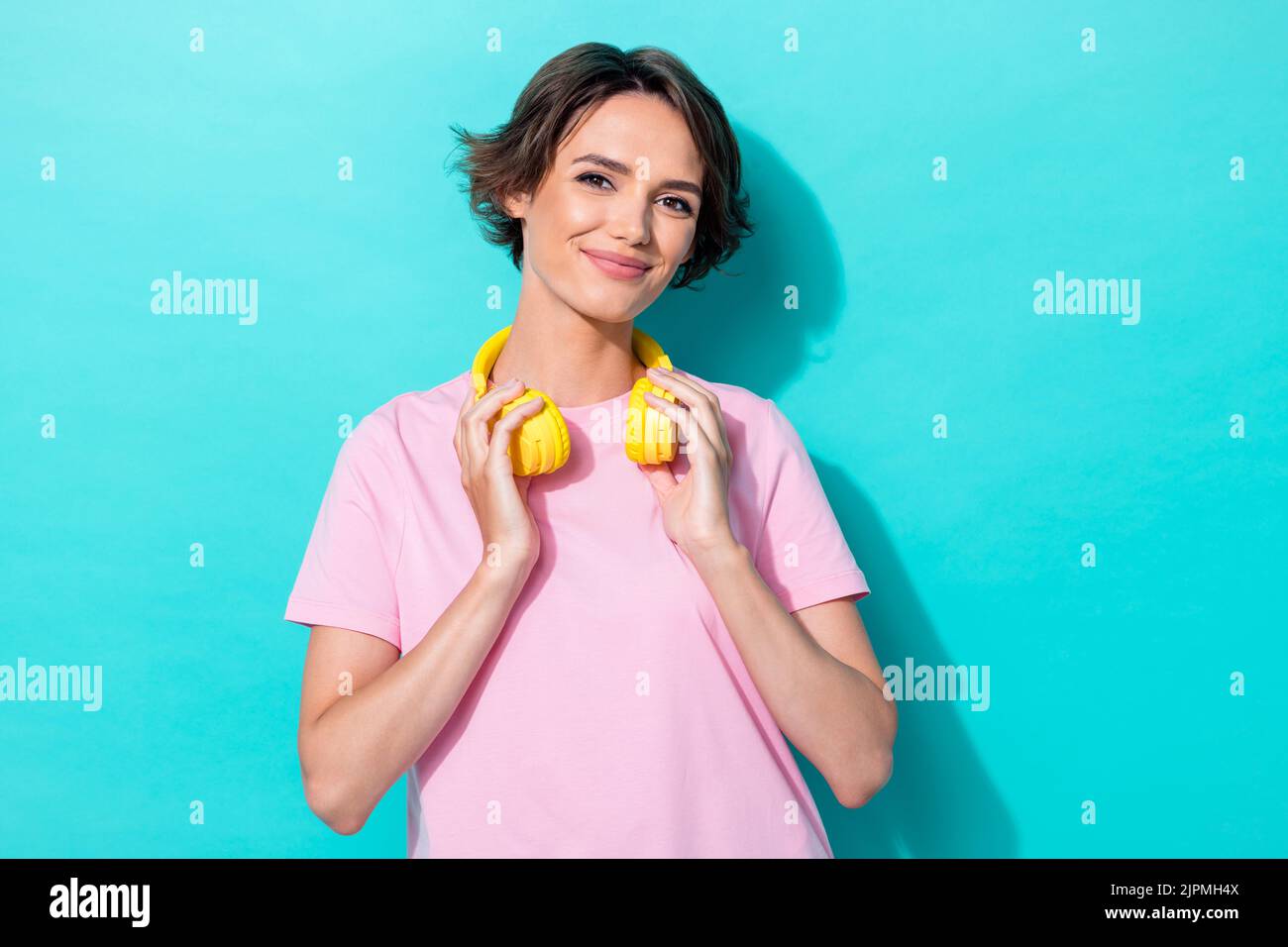 Portrait of sweet lovely cute lady arm hold touch headphone music ...