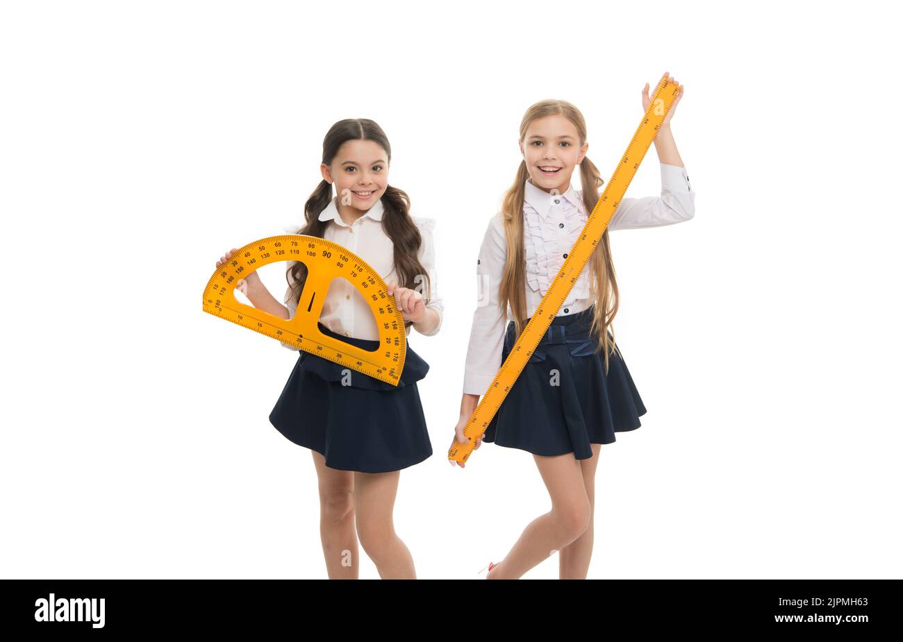 Draw geometric figures. Pupils cute girls with big rulers. Favorite ...