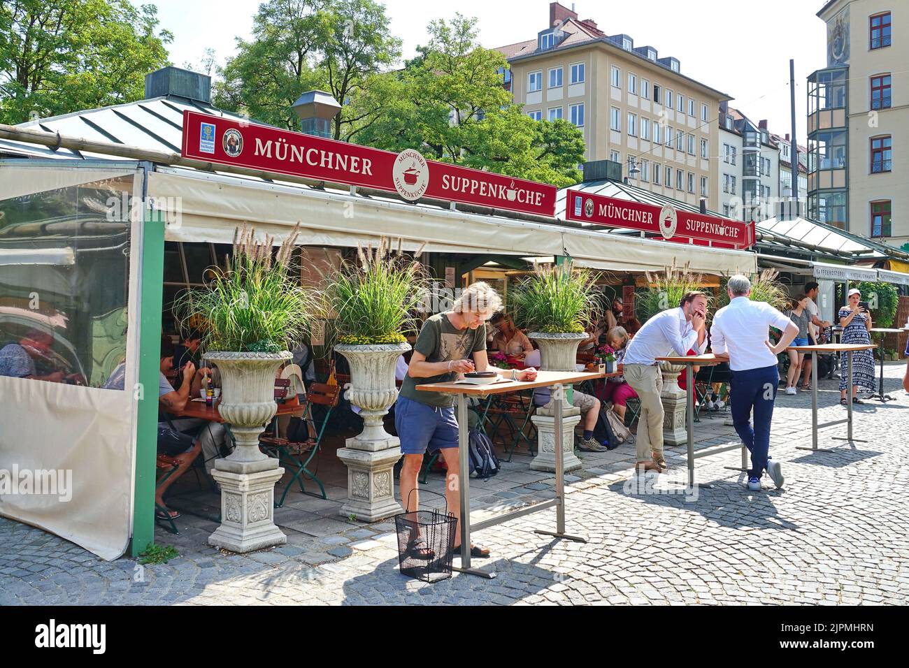 People at the Munich Viktualienmarkt. Munich's most famous permanent ...