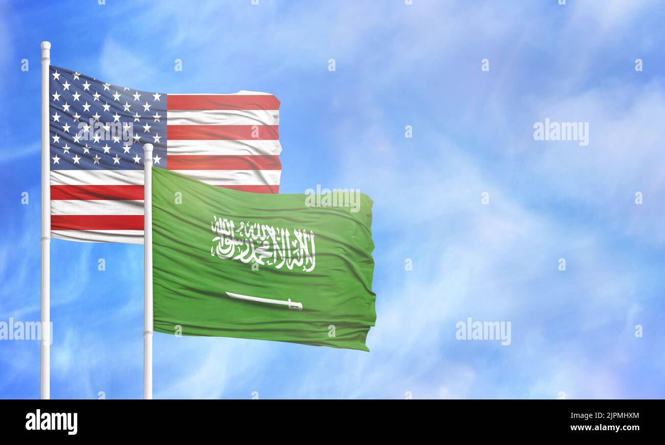 Waving American flag and flag of Saudi Arabia Stock Photo - Alamy