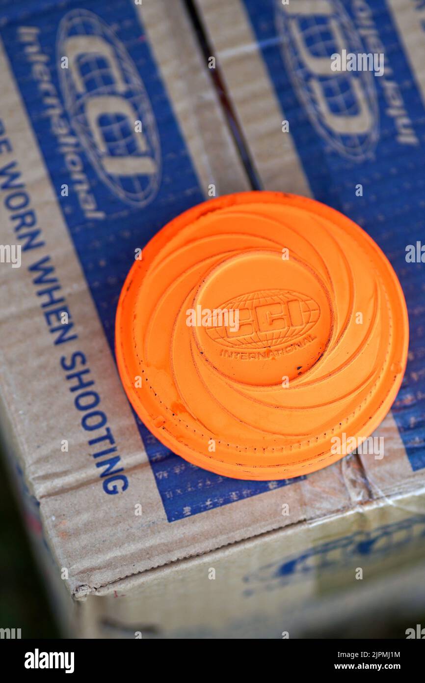 clay pigeon disc made by CGI on top of a box of discs Stock Photo - Alamy
