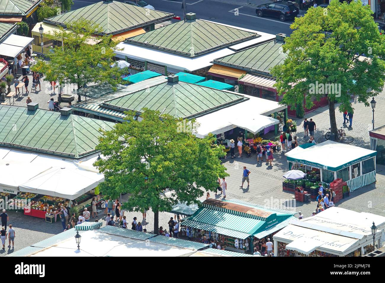 People at the Munich Viktualienmarkt. Munich's most famous permanent ...