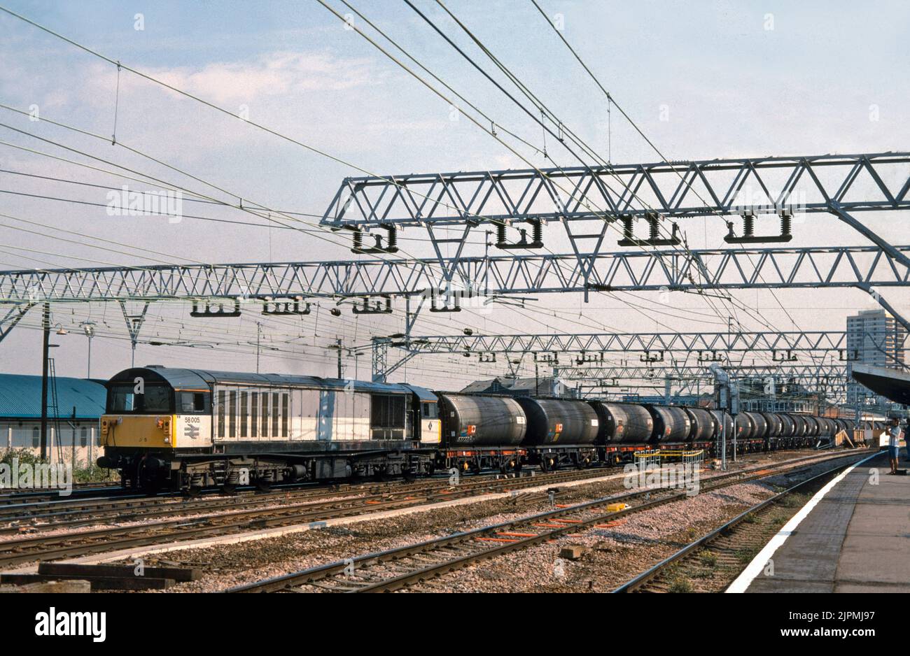 A Class 58 diesel locomotive number 58005 passes Stratford railway ...