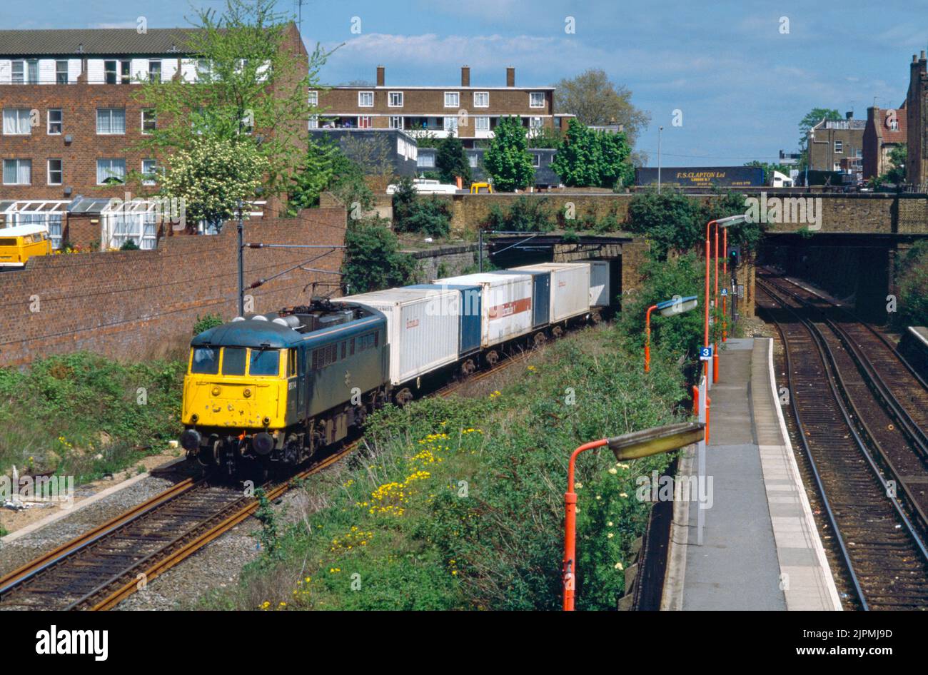 A Class 85 electric locomotive number 85114 working a well loaded ...