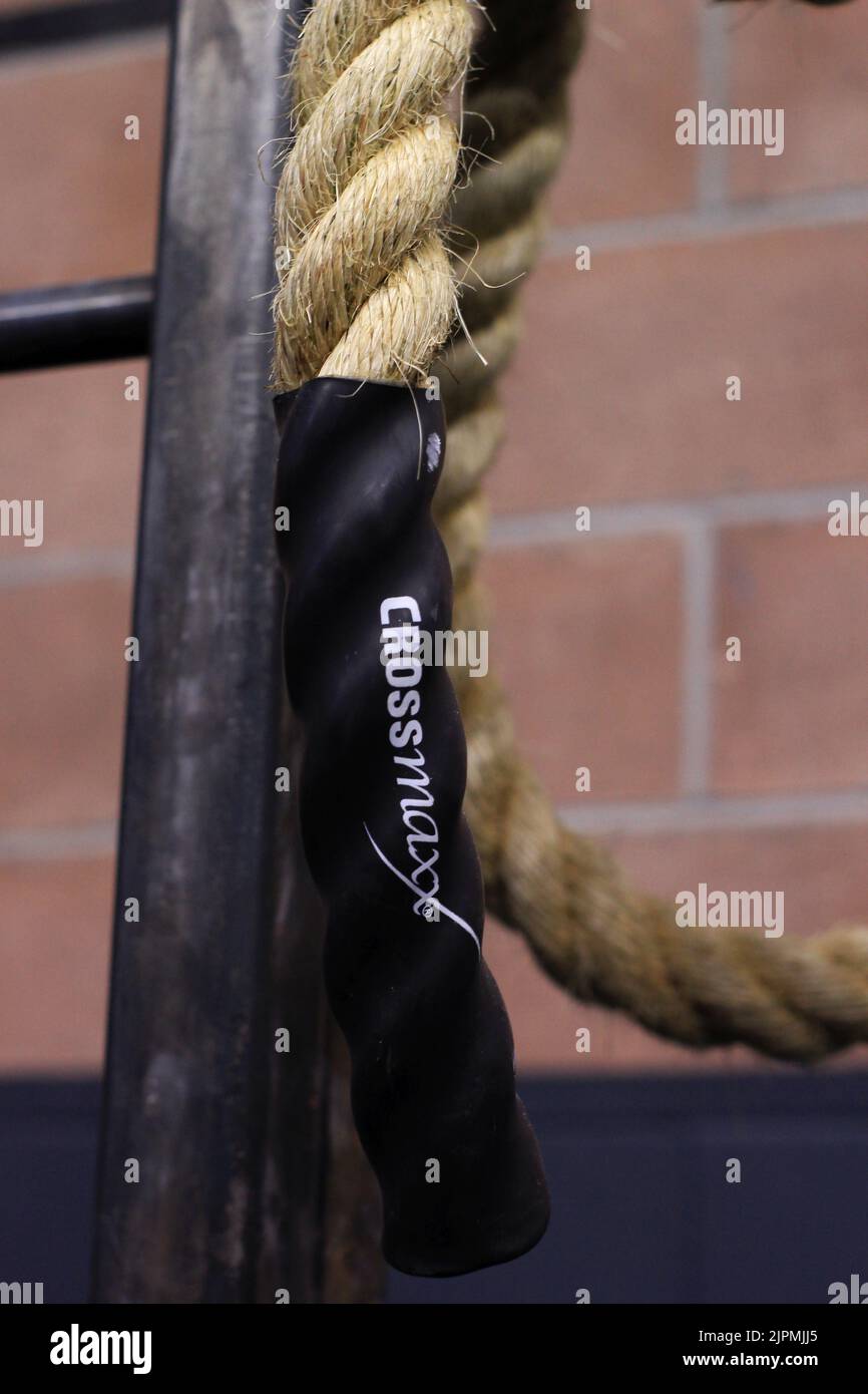 Hanging off rope hi-res stock photography and images - Alamy