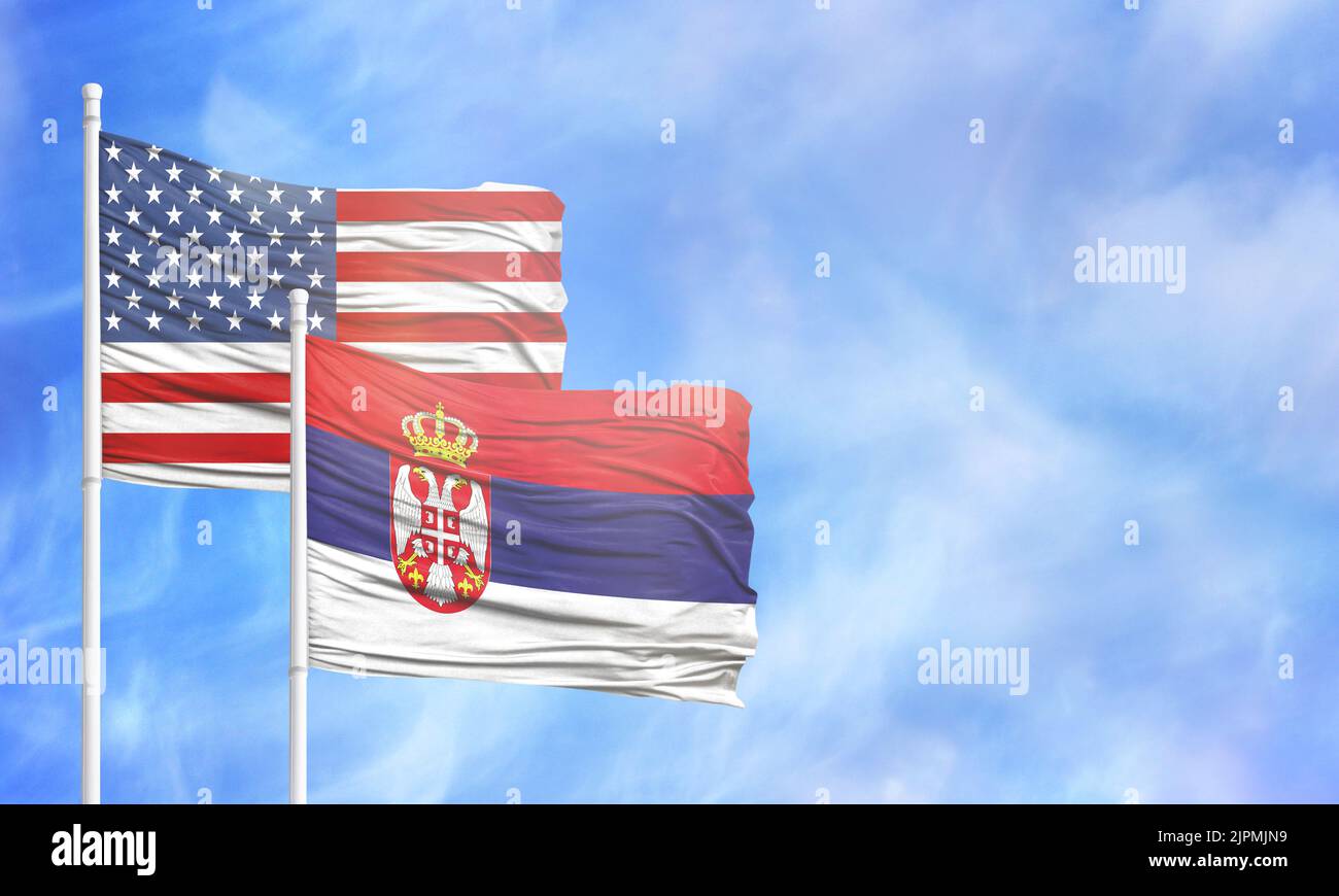 Waving American flag and flag of Serbia Stock Photo - Alamy