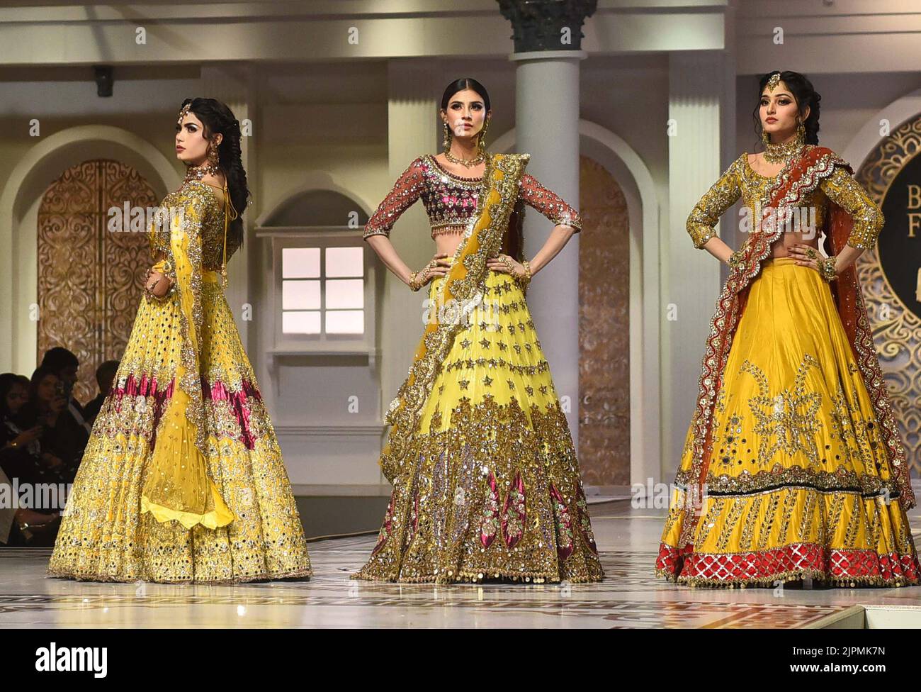 Karachi. 18th Aug, 2022. Models present creations during a bridal ...
