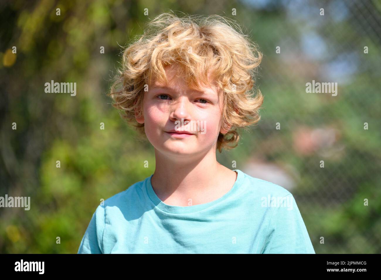 Hamburg, Germany. 16th Aug, 2022. Young actor Lewe Wagner stands under ...
