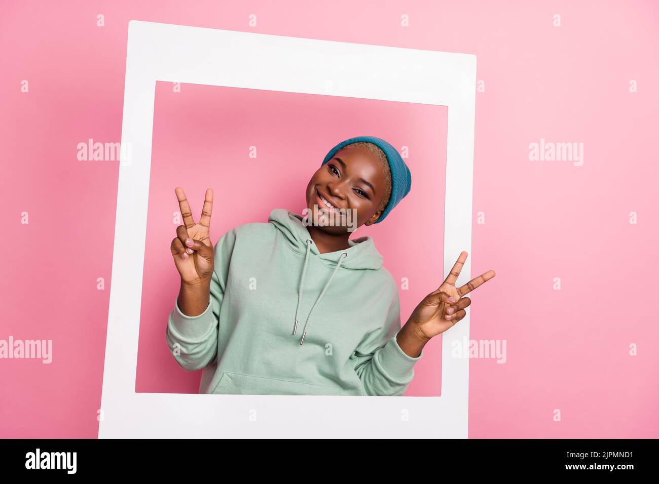 Photo of young good looking pretty woman in frame picture showing v ...