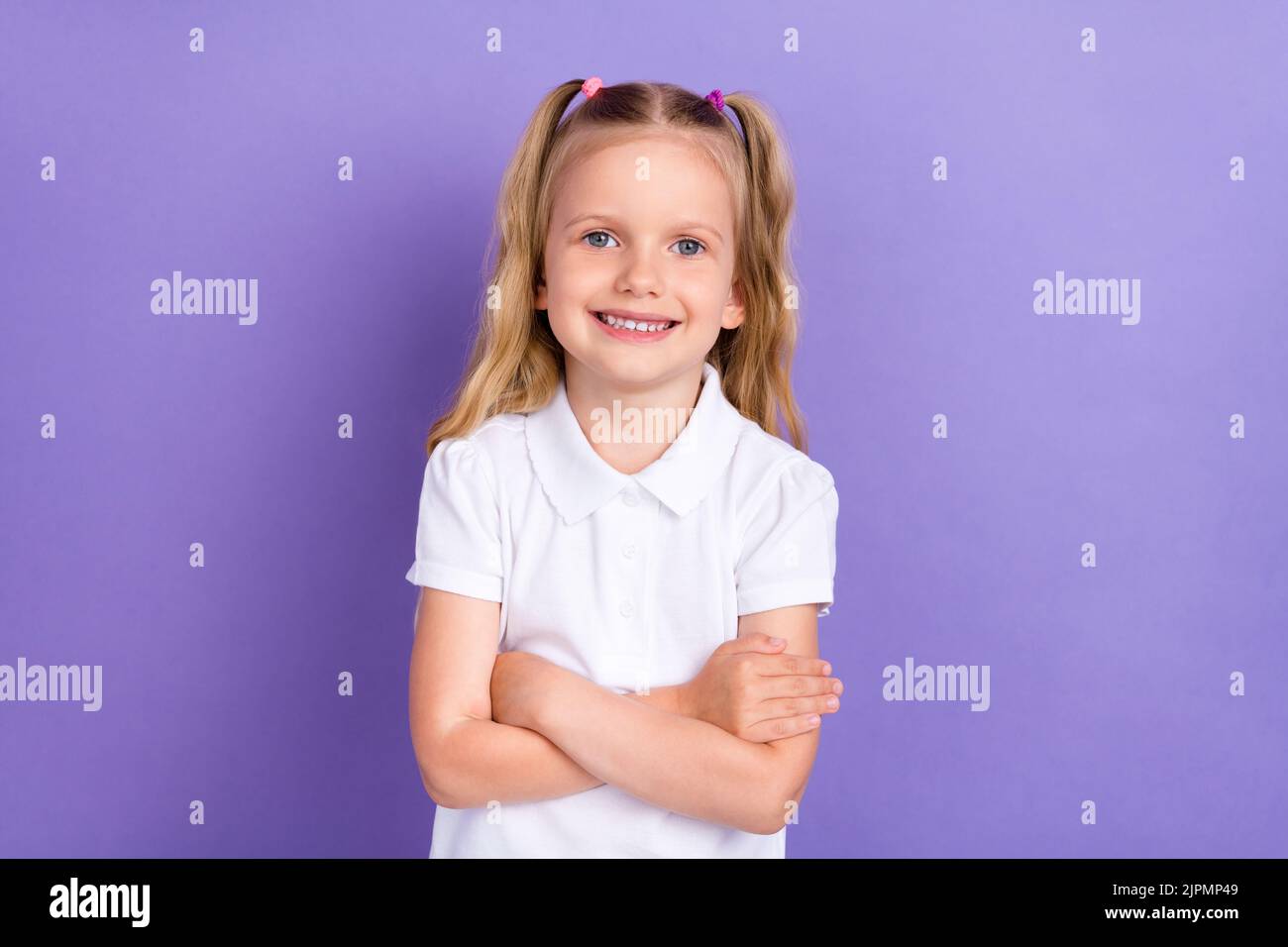 Photo portrait of cheerful schoolgirl ponytails confident hands crossed ...