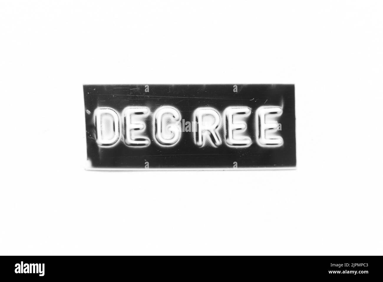Black color banner that have embossed letter with word degree on white ...