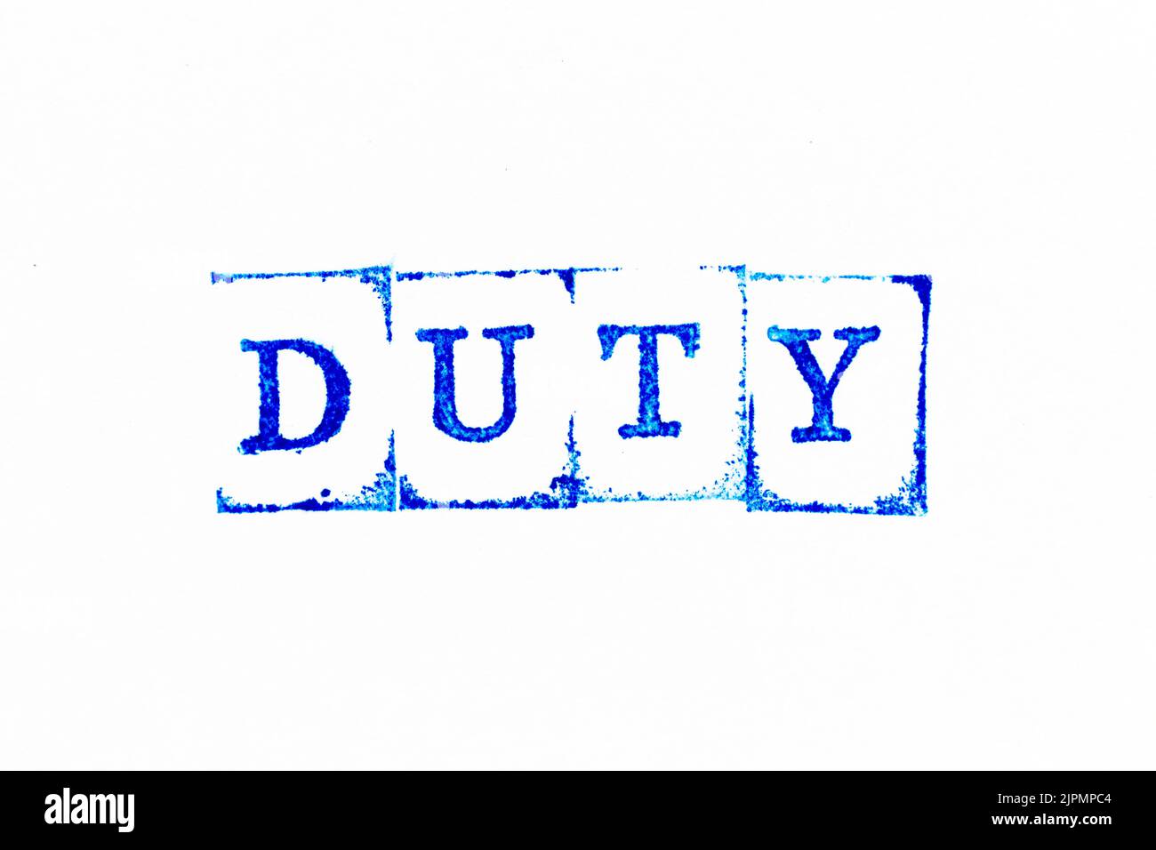 Blue color ink rubber stamp in word duty on white paper background ...