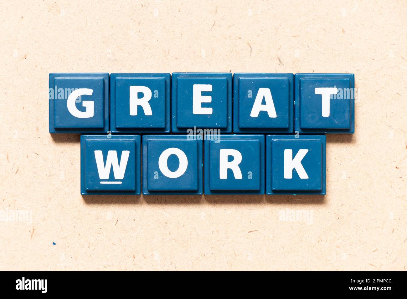 Tile letter in english word great work on wood background Stock Photo ...
