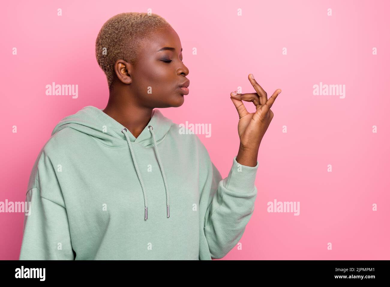 Profile side photo of young female with short hair trying tasty food ...
