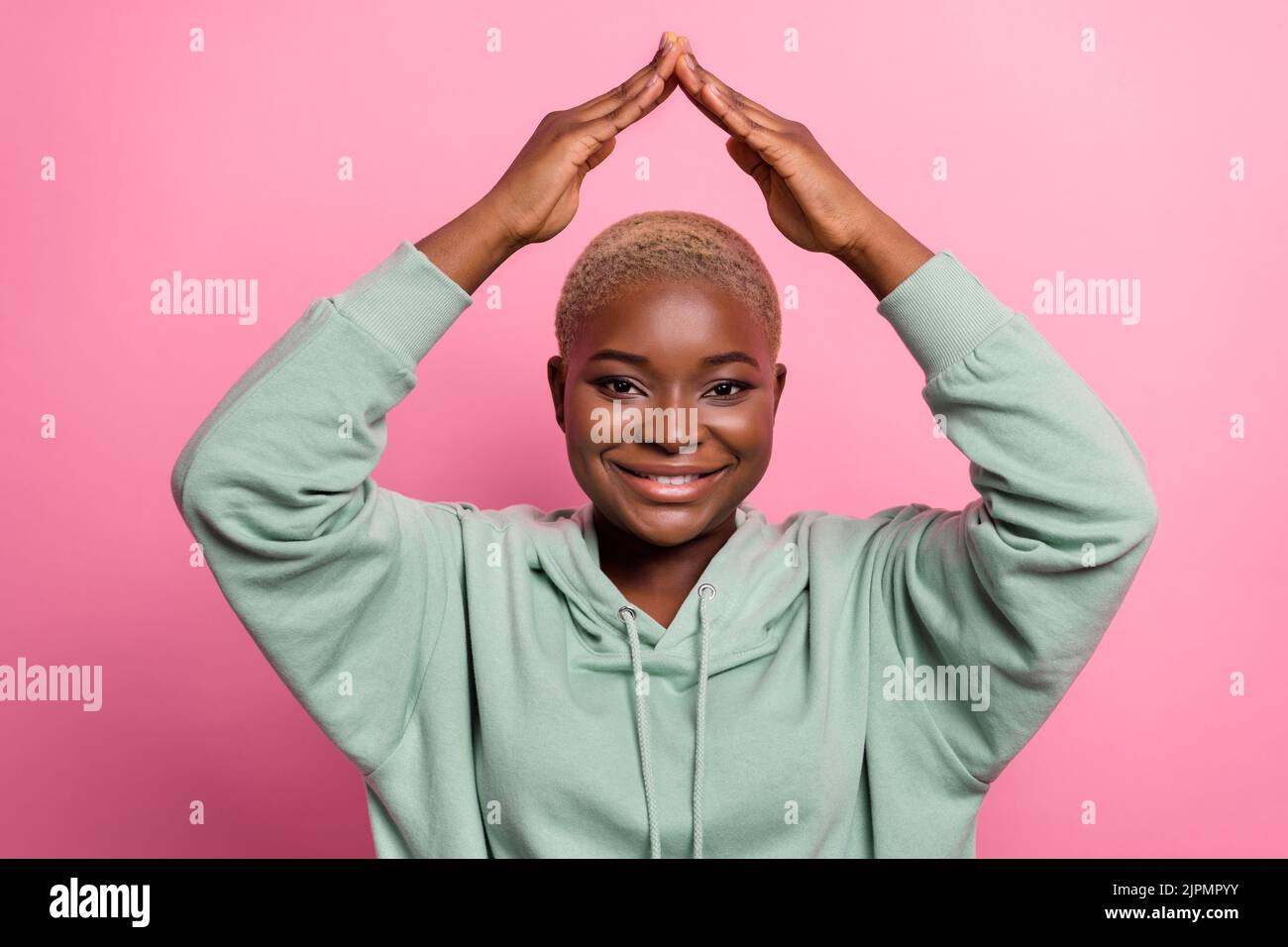 Portrait of attractive good mood lady move to new home apartment hold ...