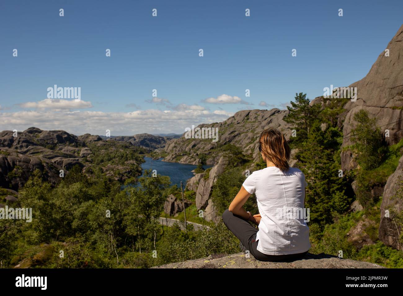 Happy people, enjoying amazing views in South Norway coastline, fjords ...