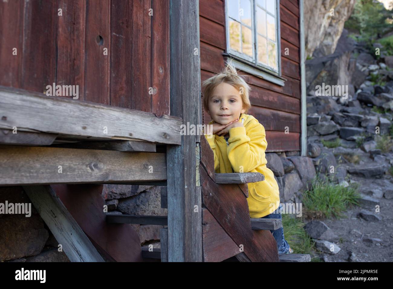 Happy people, enjoying amazing views in South Norway coastline, fjords ...