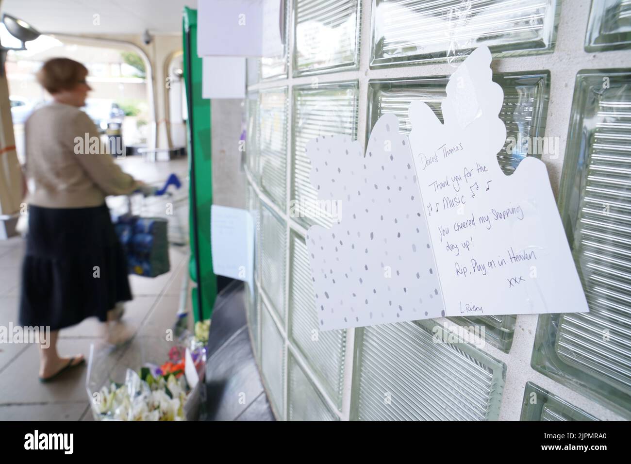 Messages and view floral tributes left outside Perivale Tesco ...