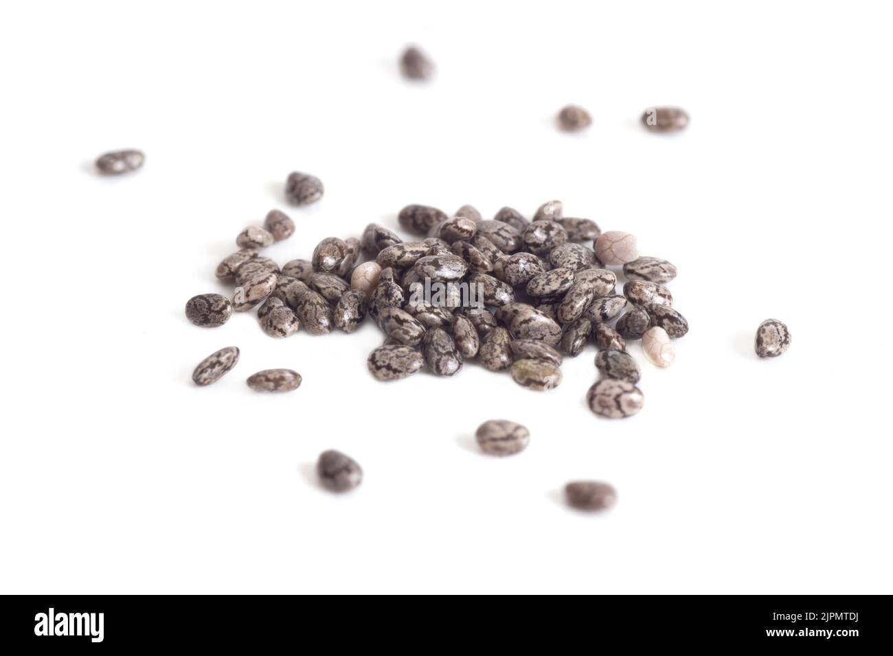 Pile of dry chia seeds isolated on white background, extreme macro ...
