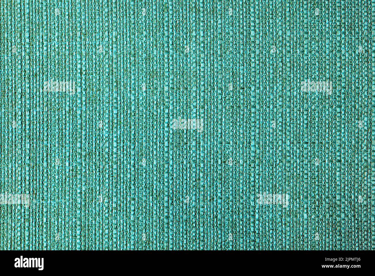 Close-up texture of natural turquoise coarse weave fabric or cloth ...