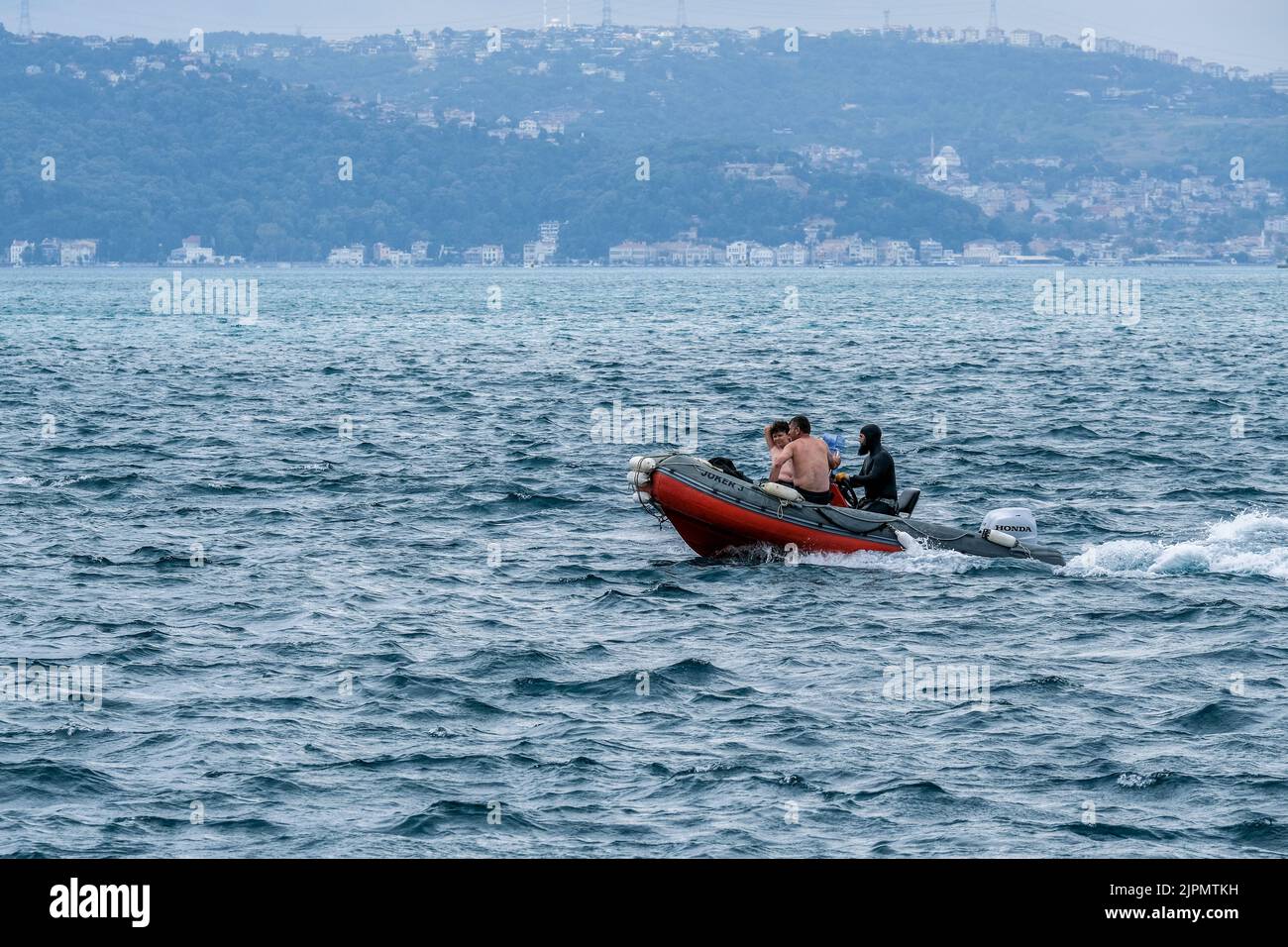 Istanbul, Turkey. 10th Aug, 2022. Harpoon fishermen seen on their boat ...