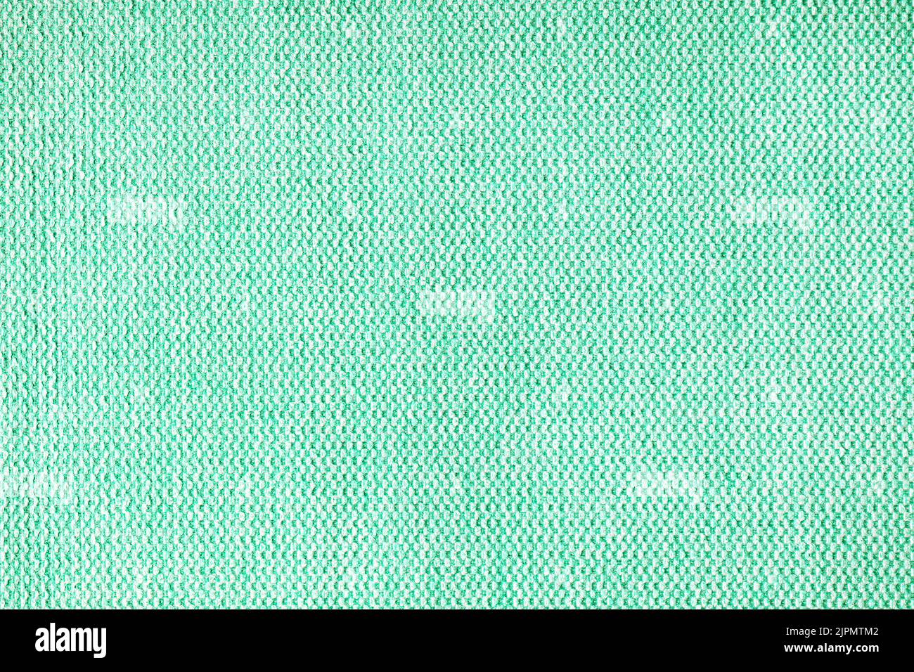 Close-up texture of natural turquoise coarse weave fabric or cloth ...