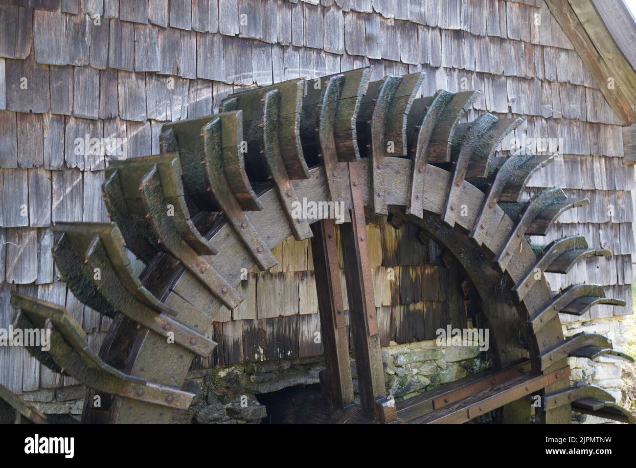 A water mill wheel on a barn Stock Photo - Alamy