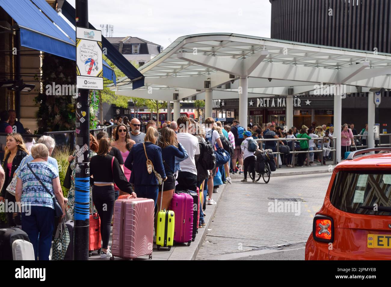 London, UK. 19th Aug, 2022. A huge queue forms at a taxi rank outside ...