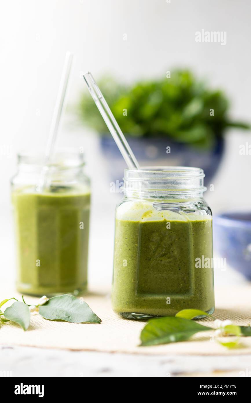 A vertical closeup of avocado smoothies Stock Photo - Alamy