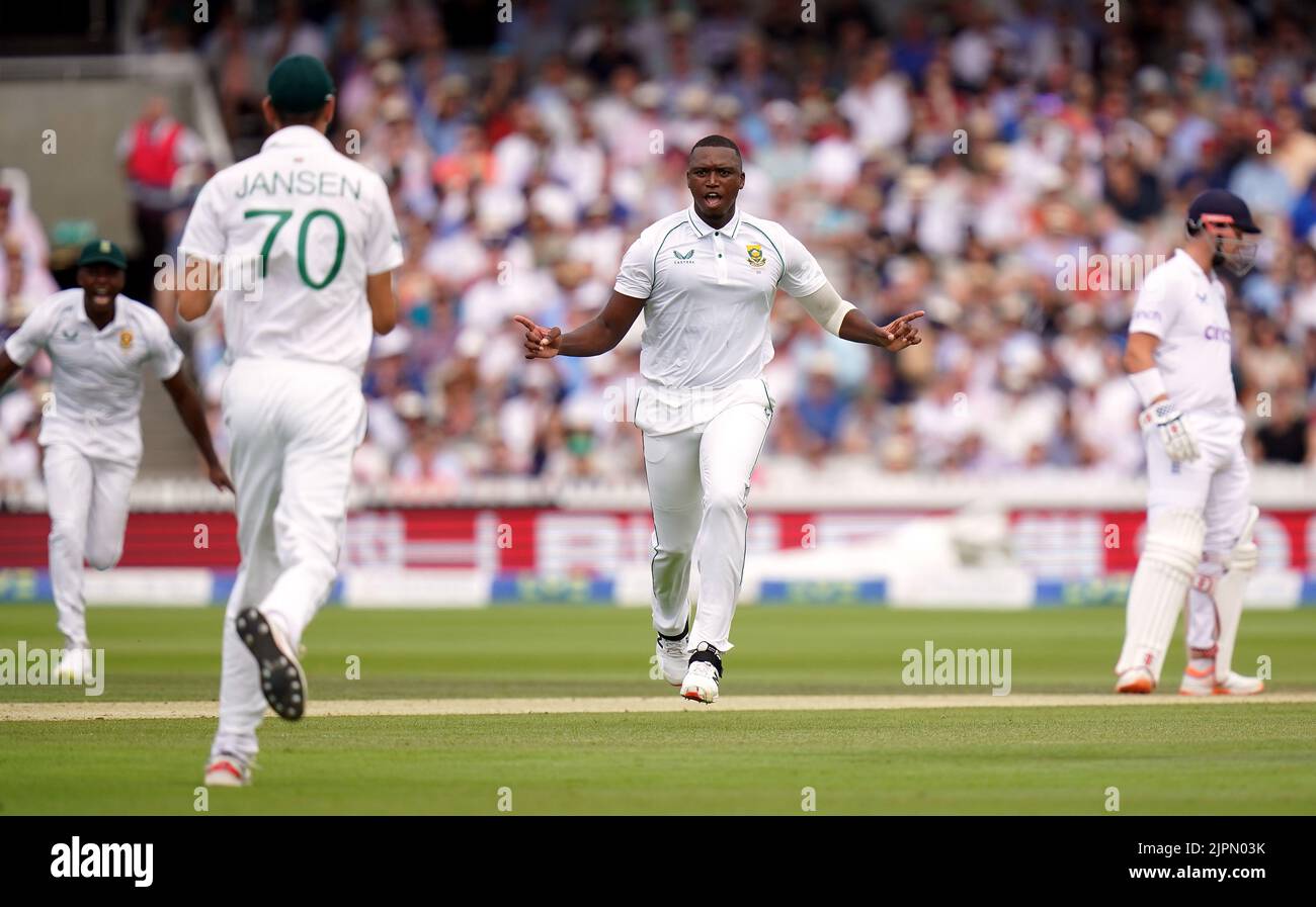 South Africa's Lungi Ngidi celebrates taking the wicket of England's ...