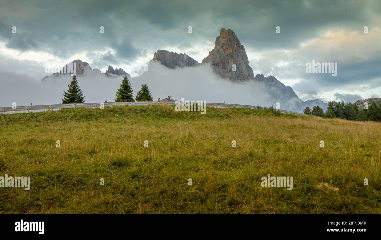 Beatifuil view of Italian Alps with dramatic clouds in the sky ...