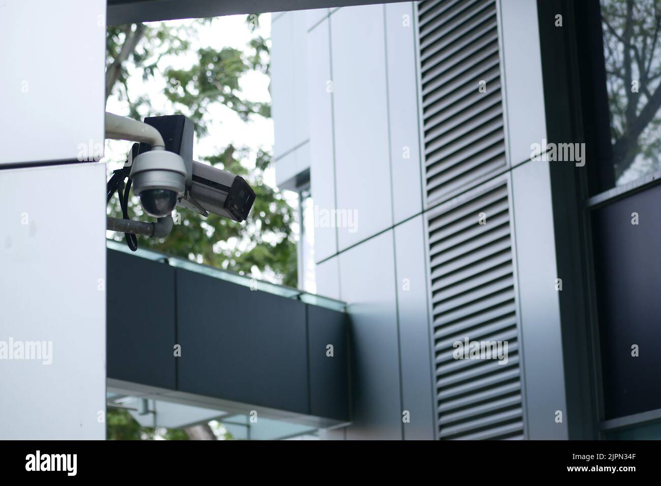 CCTV security camera operating outdoor Stock Photo - Alamy