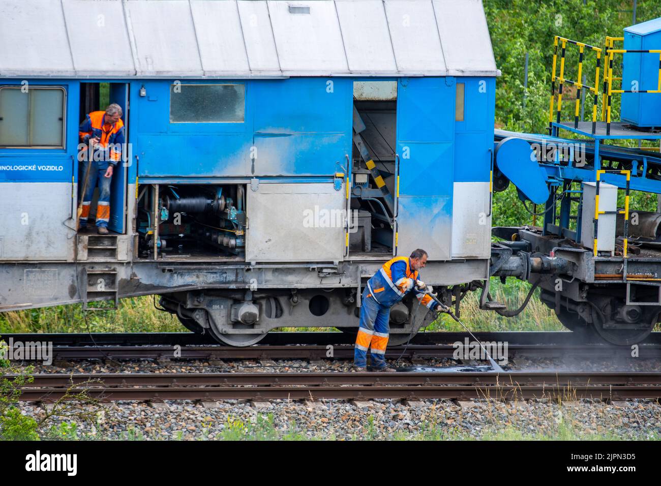 Brno, Czech republic - 19.6.2020: Railway workers are working on ...