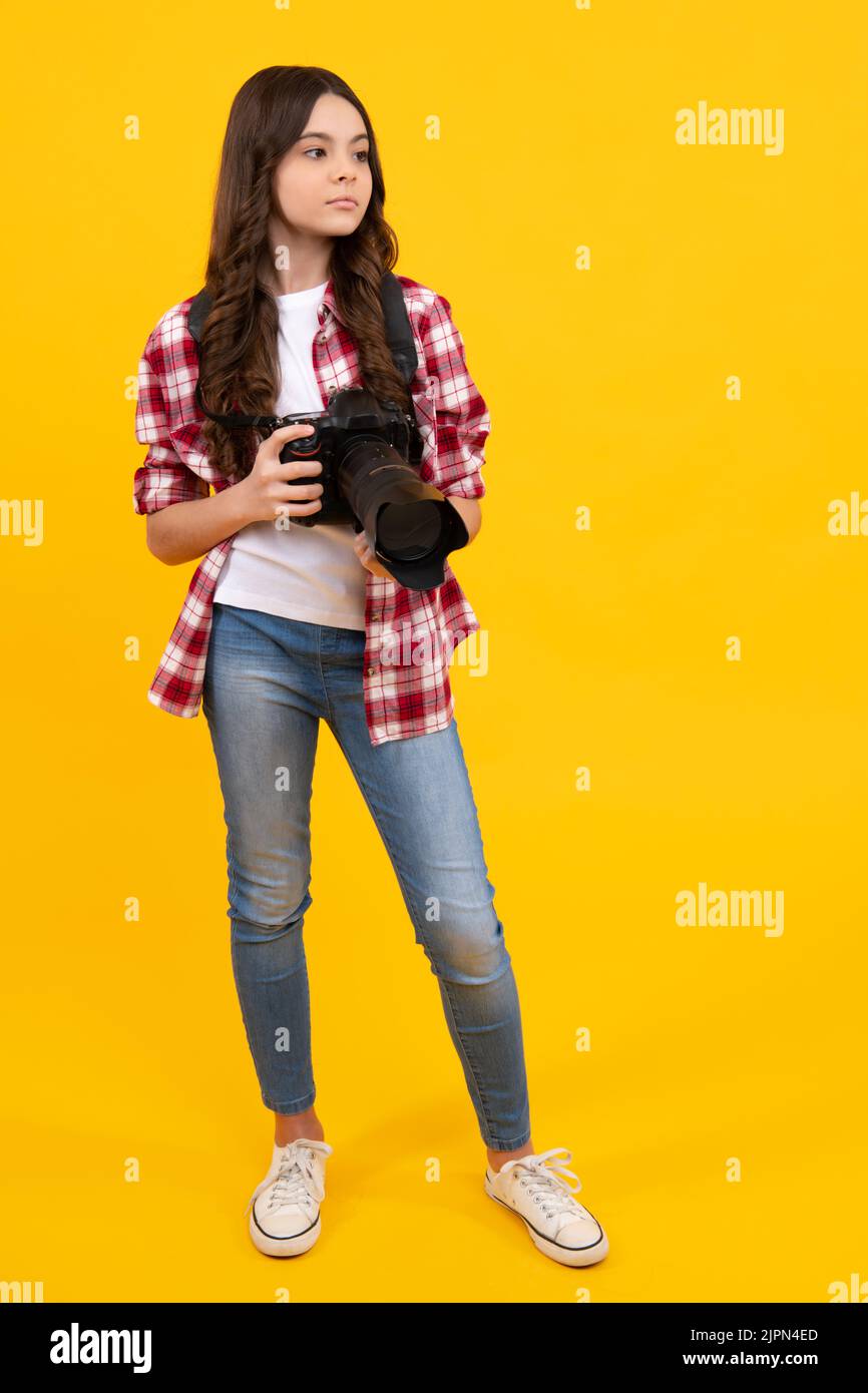 Teen girl with photo camera, young talented photographer. Photo ...