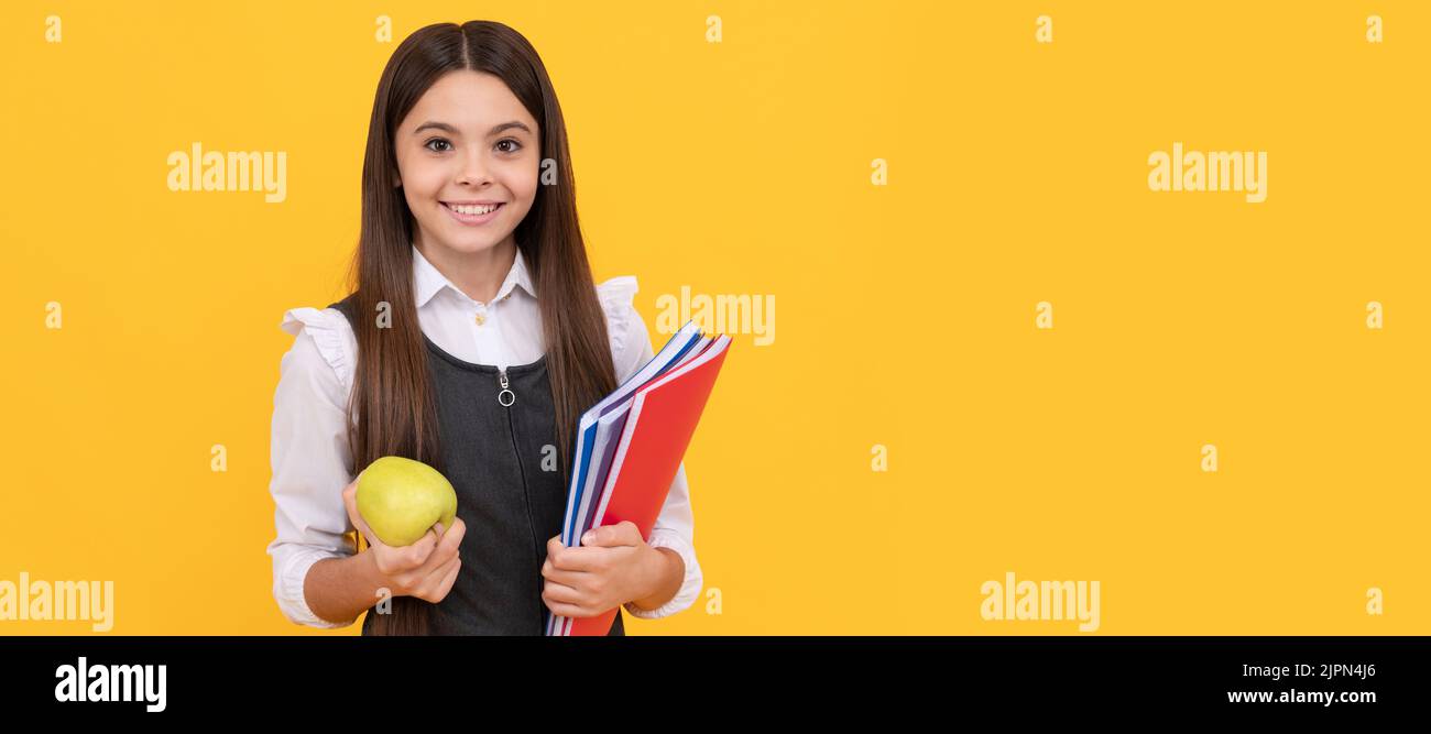 Lets start to learn for a better future. Happy kid smile holding apple ...