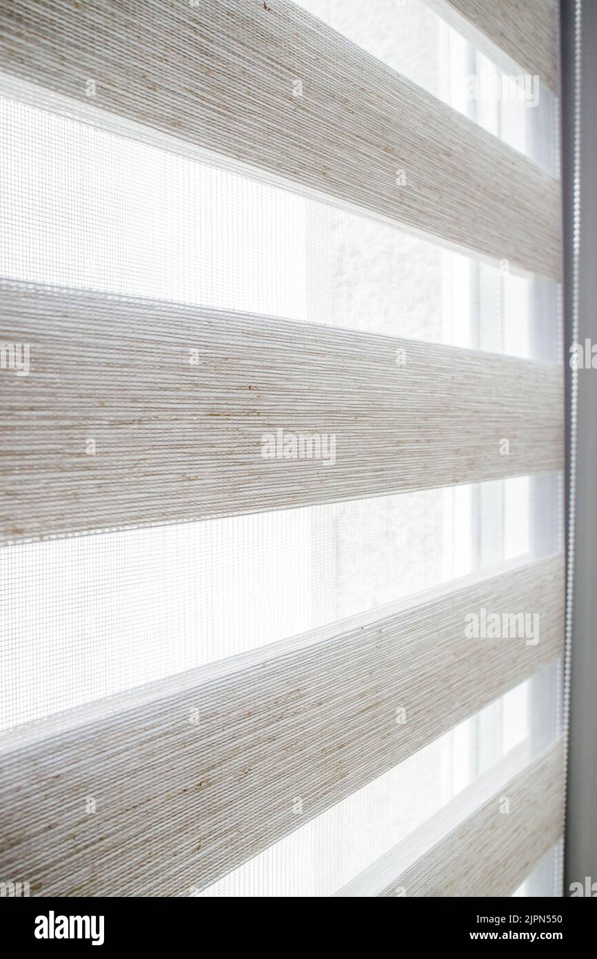 Window roller duo system day and night. Close up on roll curtains ...