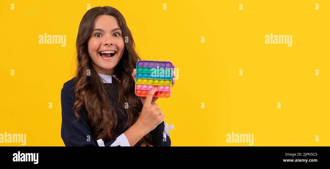 sensory fidgeting. girl with finger game. kid popping anti stress ...